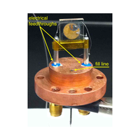 Ultrasonic interferometer for first-sound measurements of confined ...