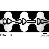 Bubble deformations and segmented flows in corrugated microchannels at ...